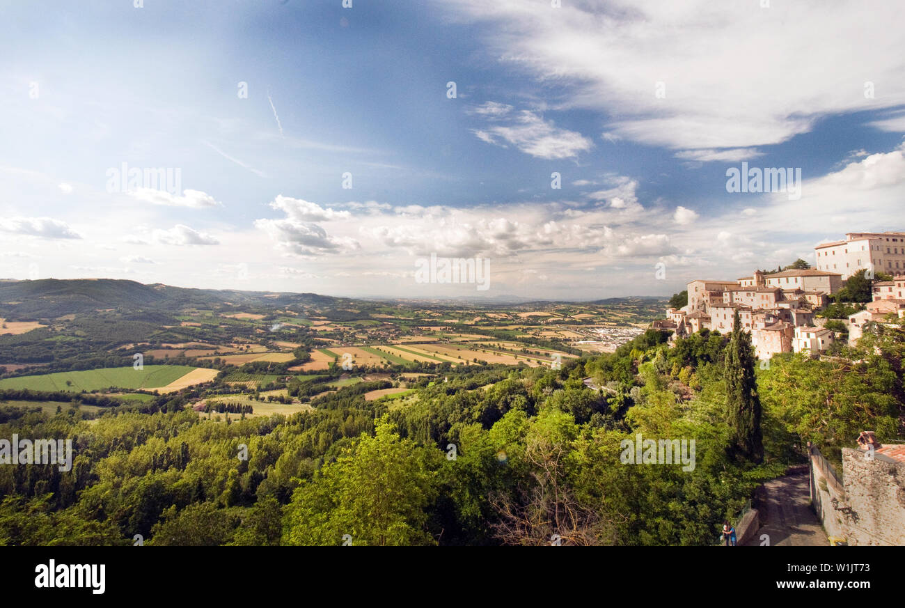 Clouds form over the rolling Umbrian countryside from the ancient ...
