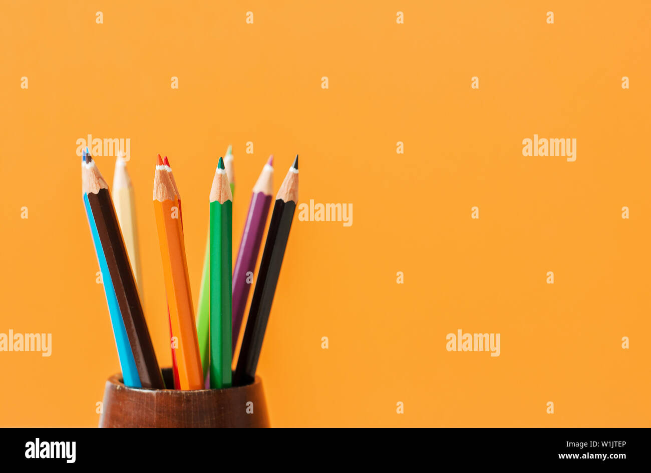 Creative Art orange Background made of colored pencils Stock Photo - Alamy