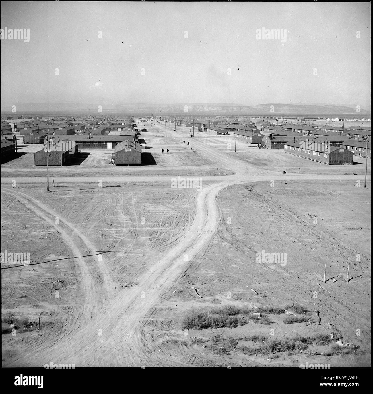 Topaz, Utah. Locking down a main thoroughfare at the Topaz Relocation ...