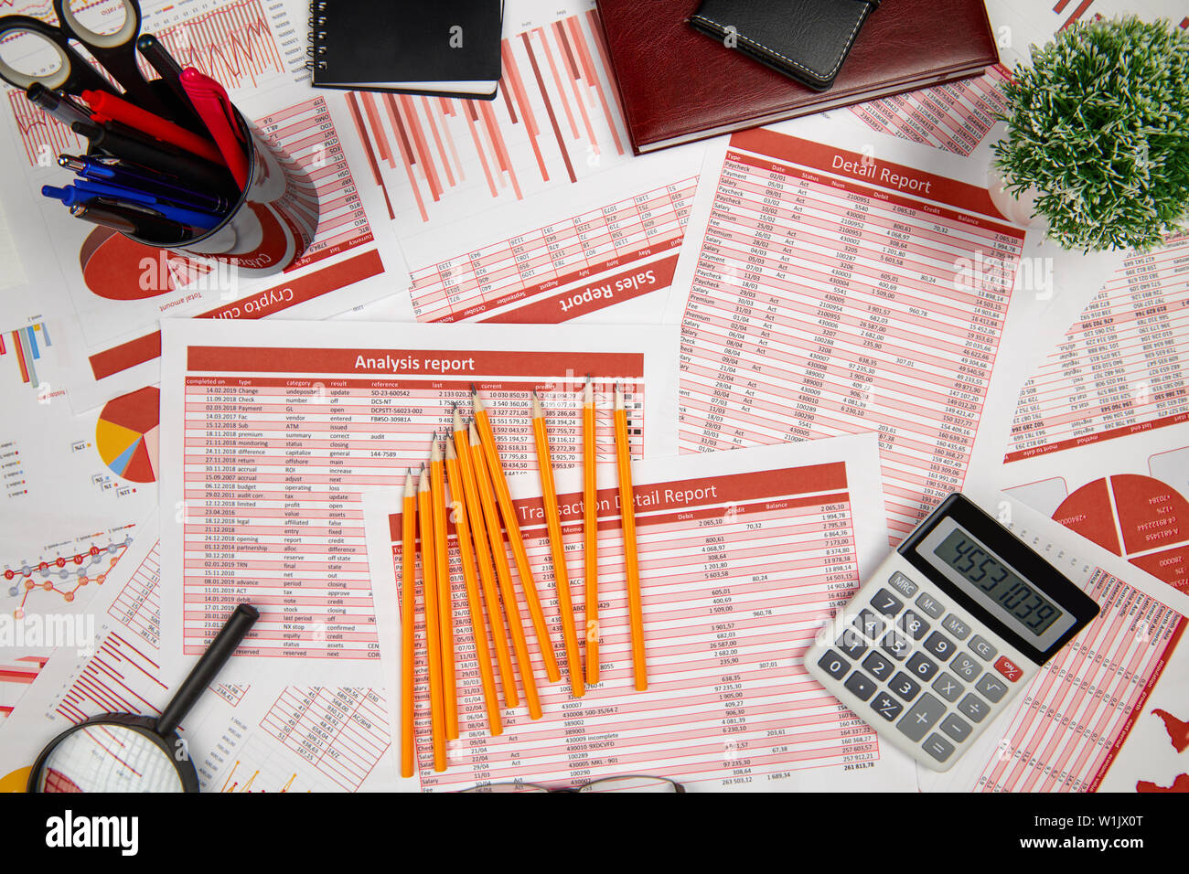 Business reports, data tables and charts - directly above view of ...