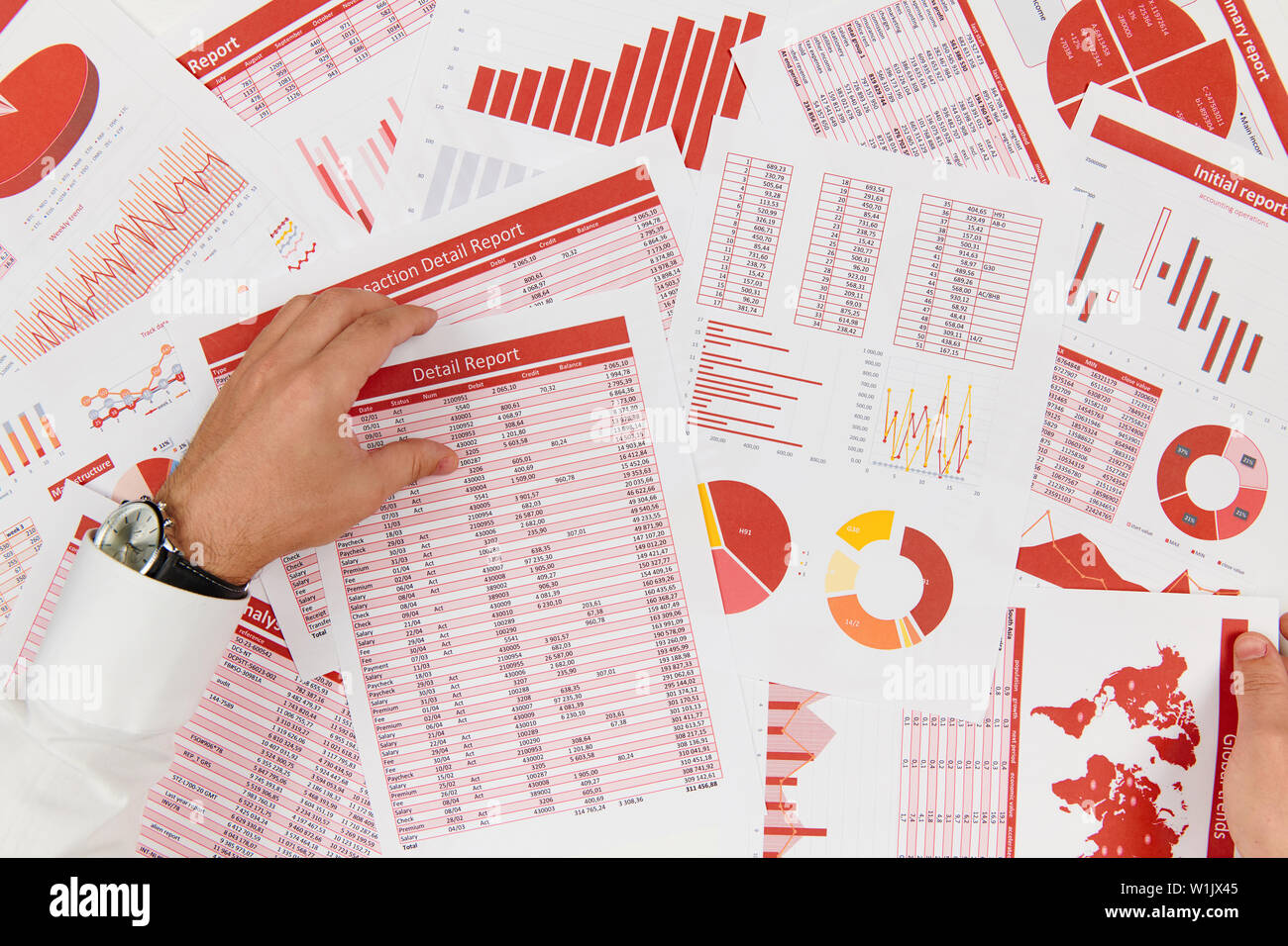 Business reports, data tables and charts - directly above view of ...