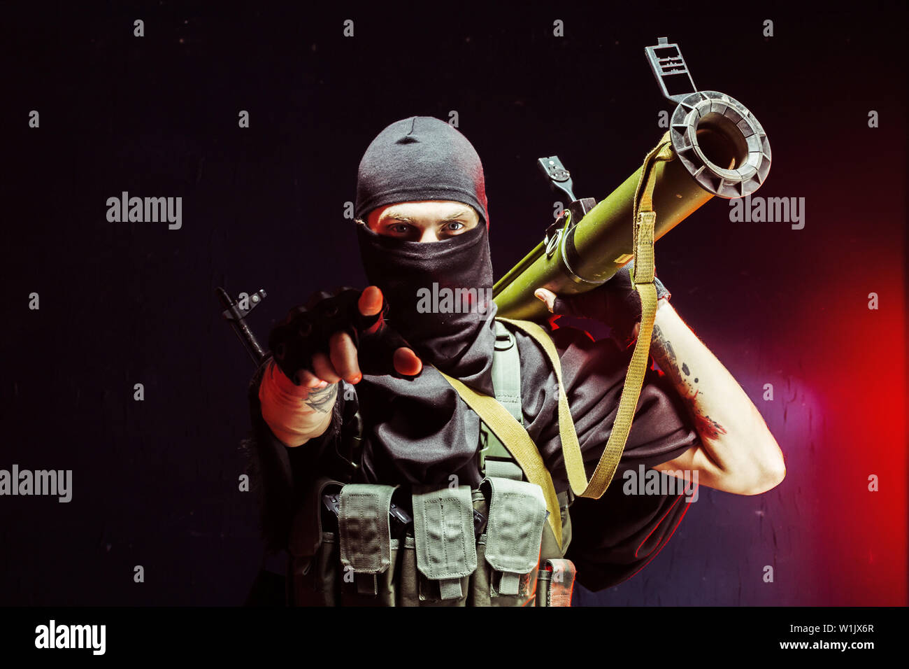 Terrorist with his weapon. Concept about terrorism Stock Photo - Alamy