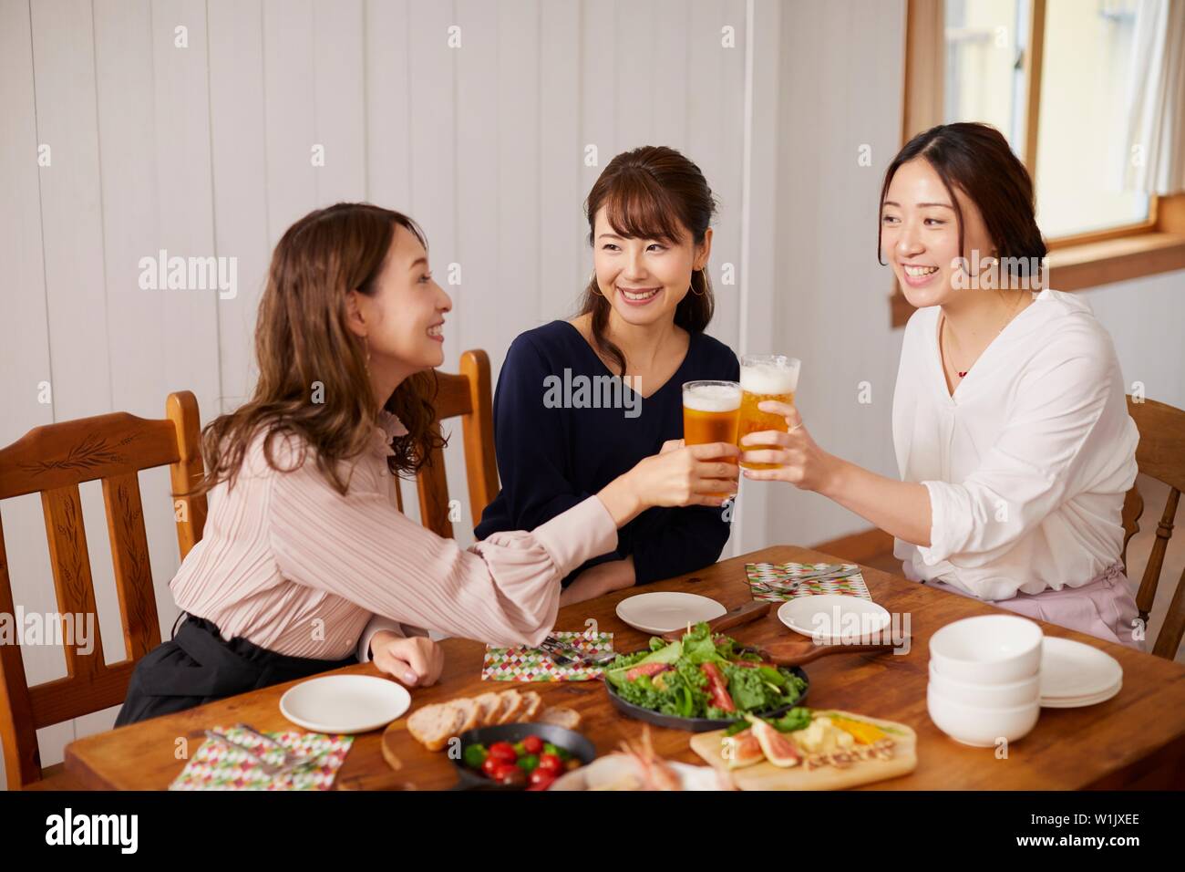 Japanese women having home party Stock Photo - Alamy