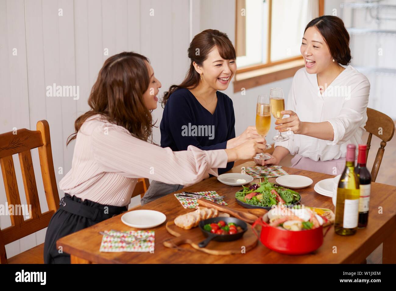 Japanese women having home party Stock Photo - Alamy