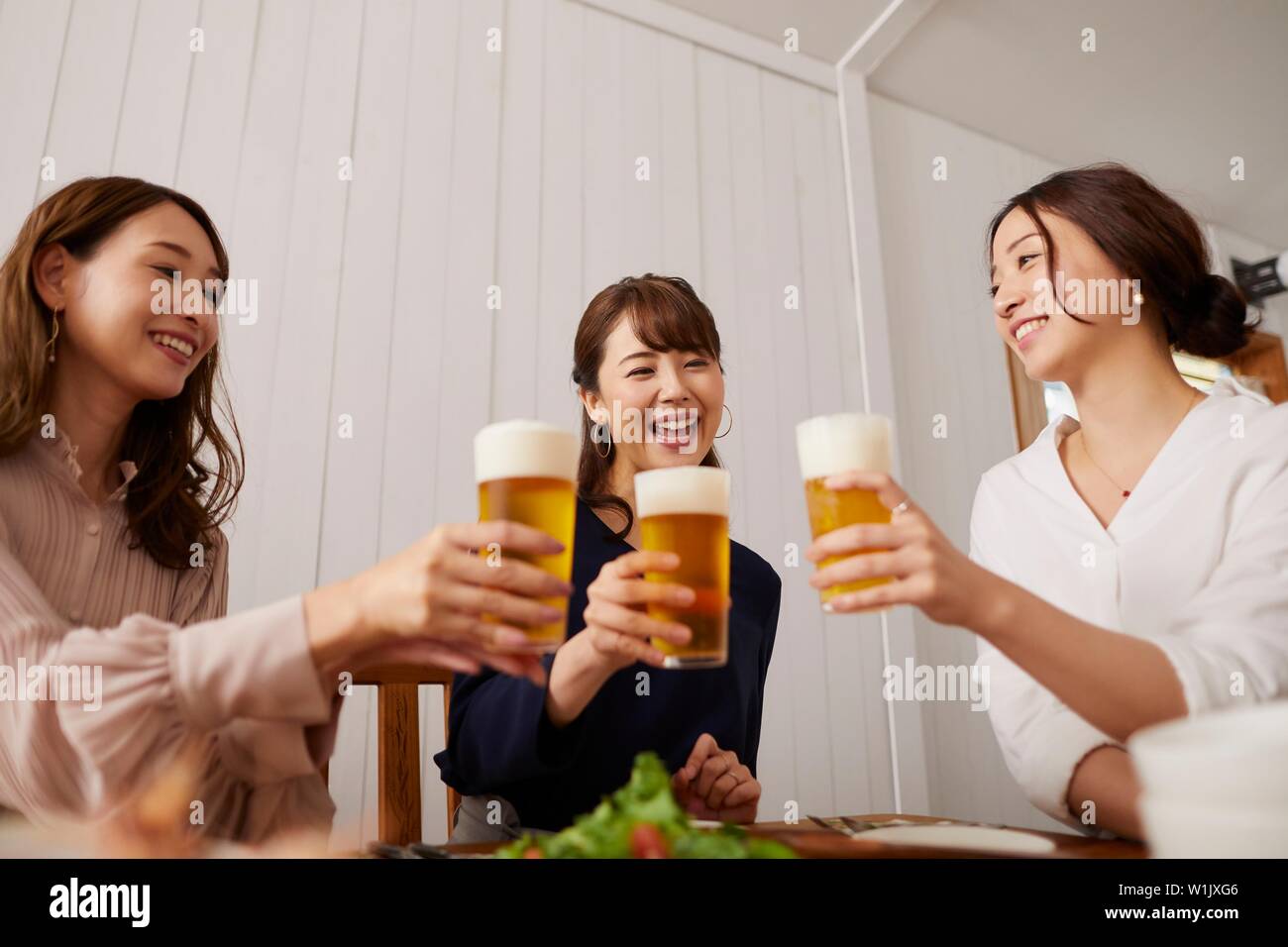 Japanese women having home party Stock Photo - Alamy