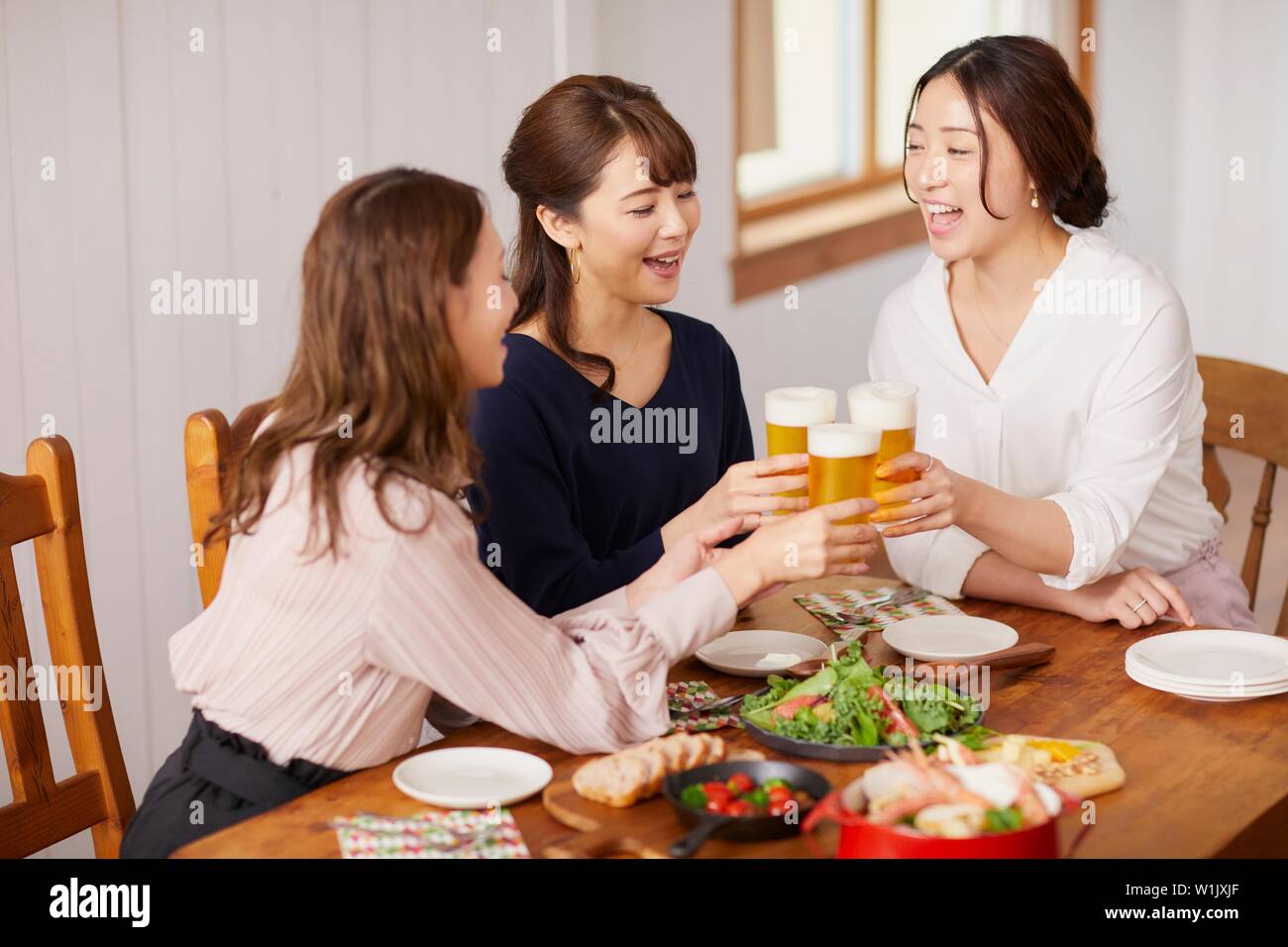 Japanese women having home party Stock Photo - Alamy