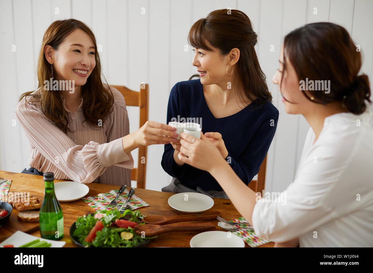 Japanese women having home party Stock Photo - Alamy