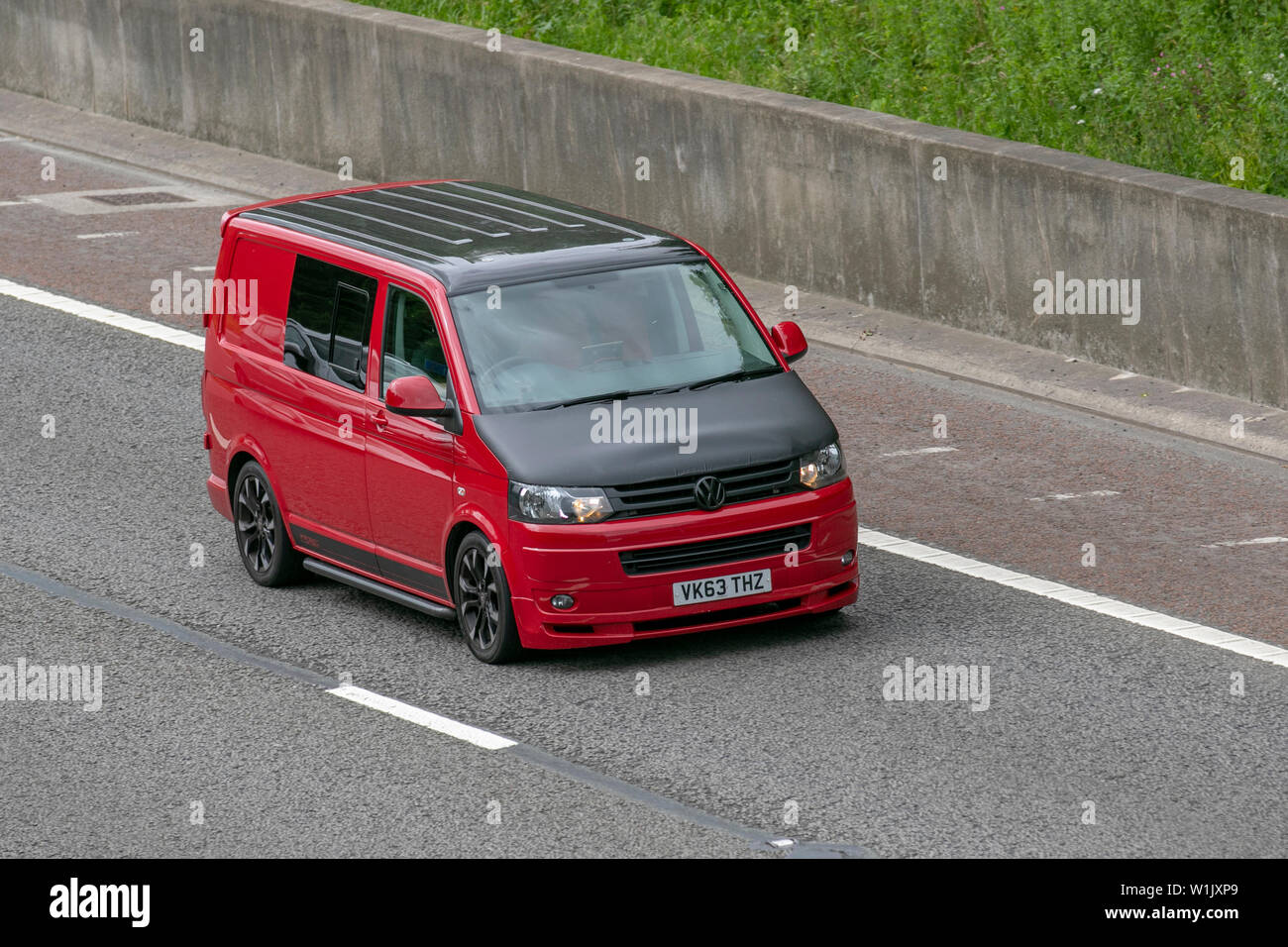 2013 red Volkswagen Tporter T28 Tline 102 TDI; M6, Lancaster, UK ...