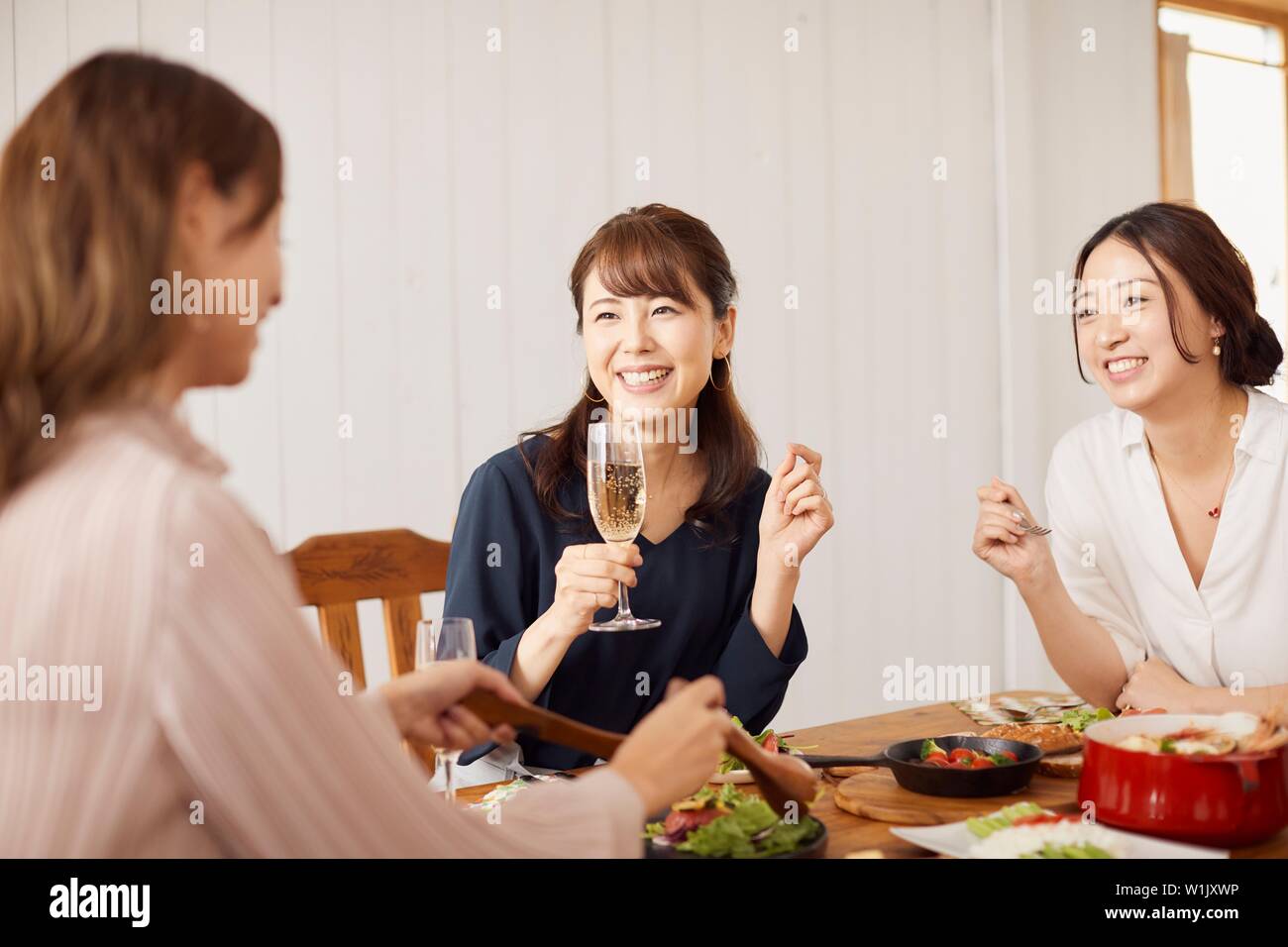 Japanese women having home party Stock Photo - Alamy