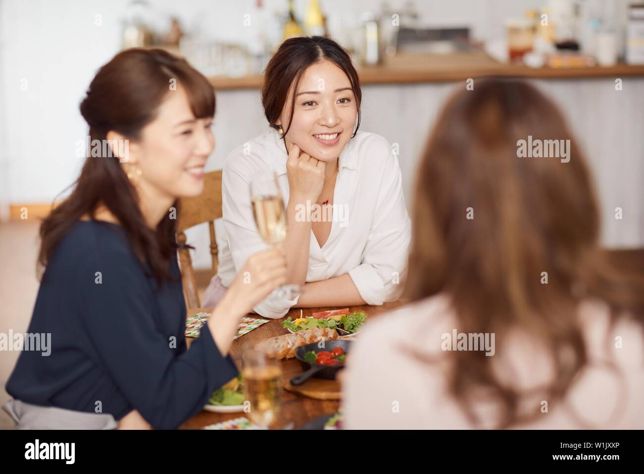 Japanese women having home party Stock Photo - Alamy