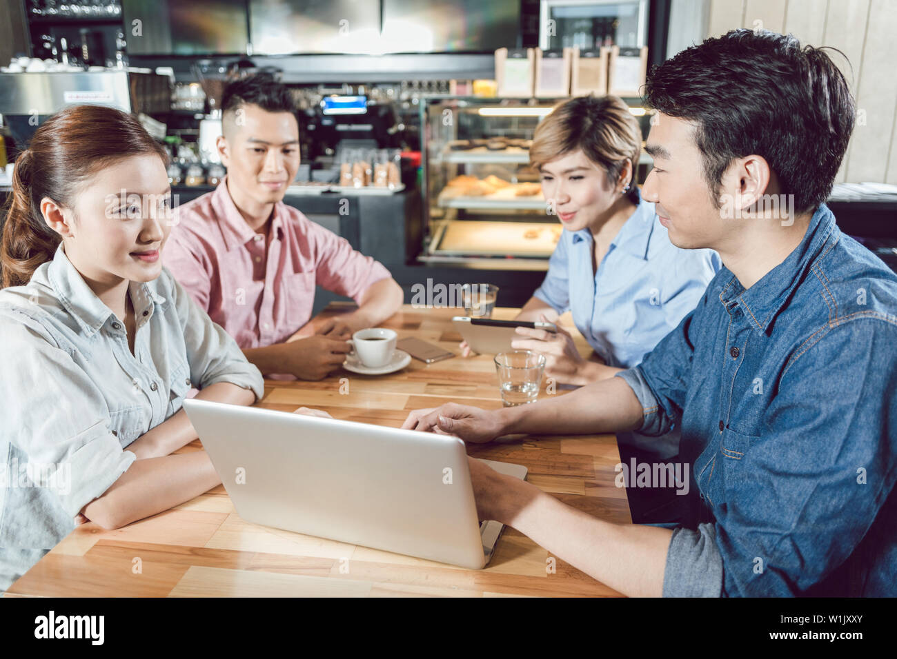Male friends enjoying in coffee shop hi-res stock photography and ...