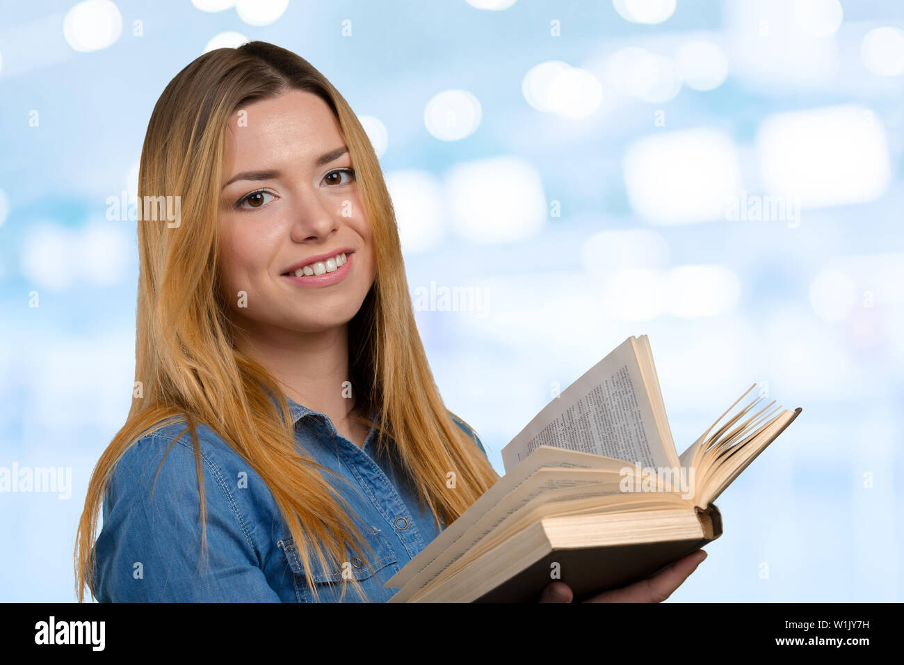 young girl with books Stock Photo - Alamy