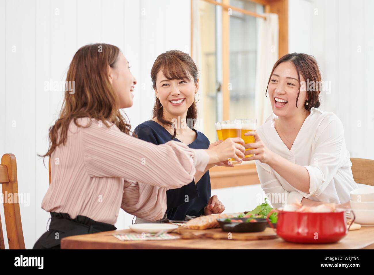Japanese women having home party Stock Photo - Alamy
