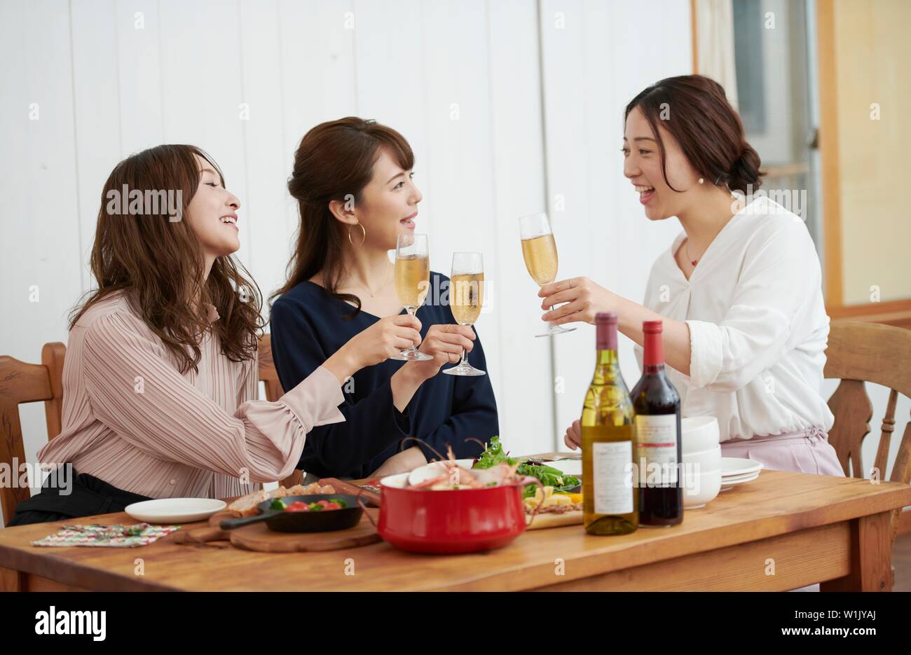 Japanese women having home party Stock Photo - Alamy