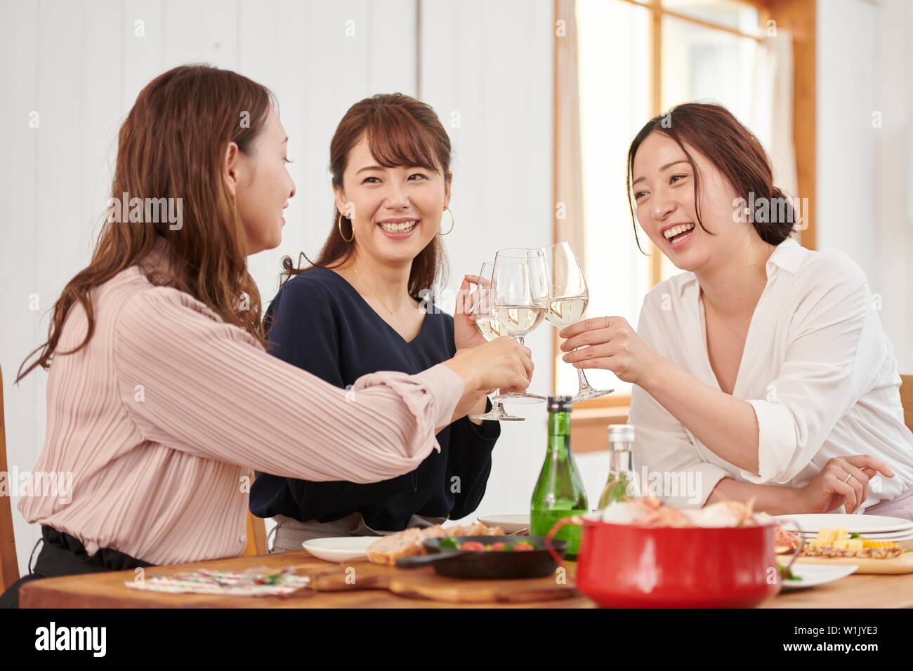 Japanese women having home party Stock Photo - Alamy