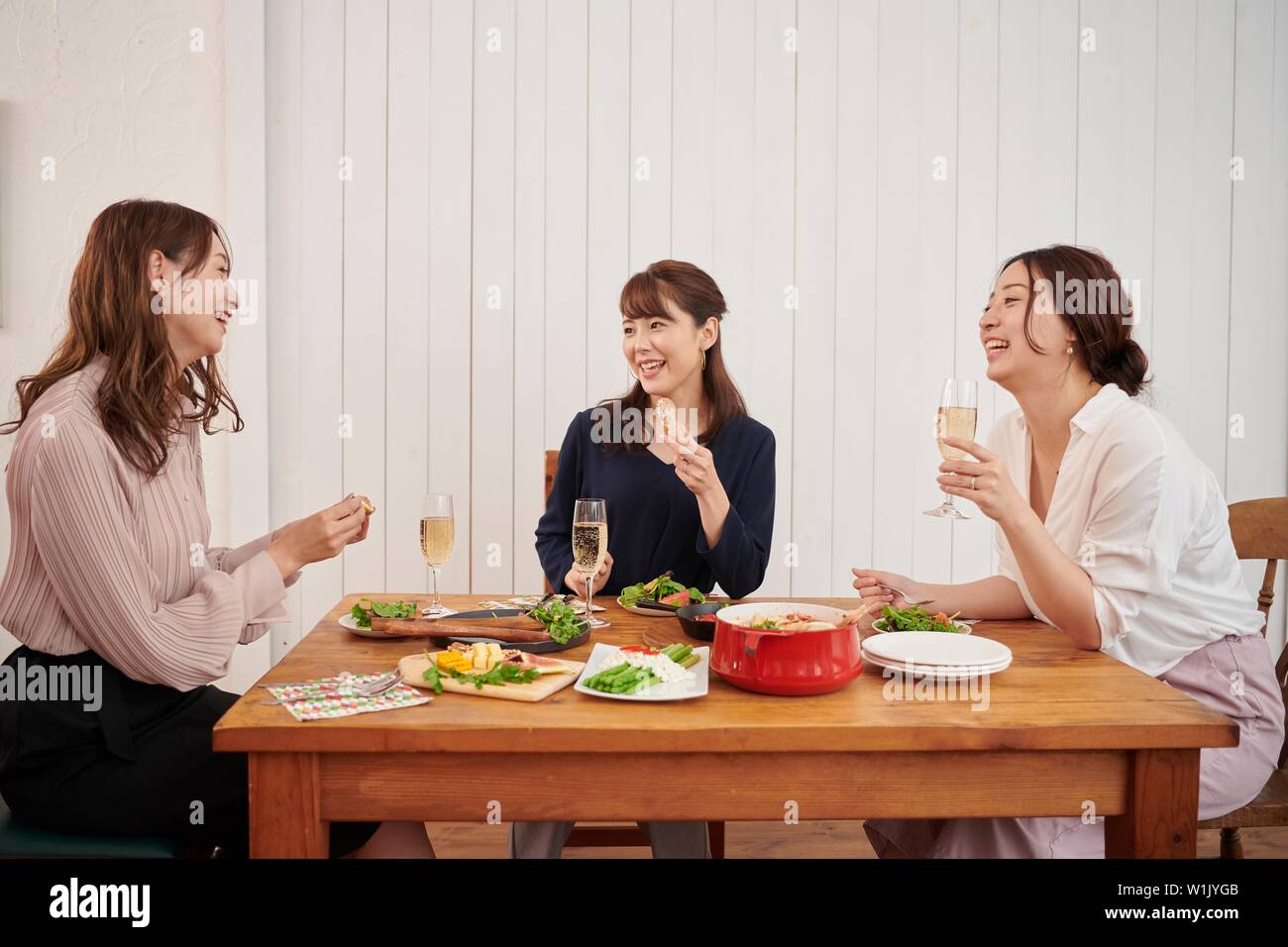 Japanese women having home party Stock Photo - Alamy