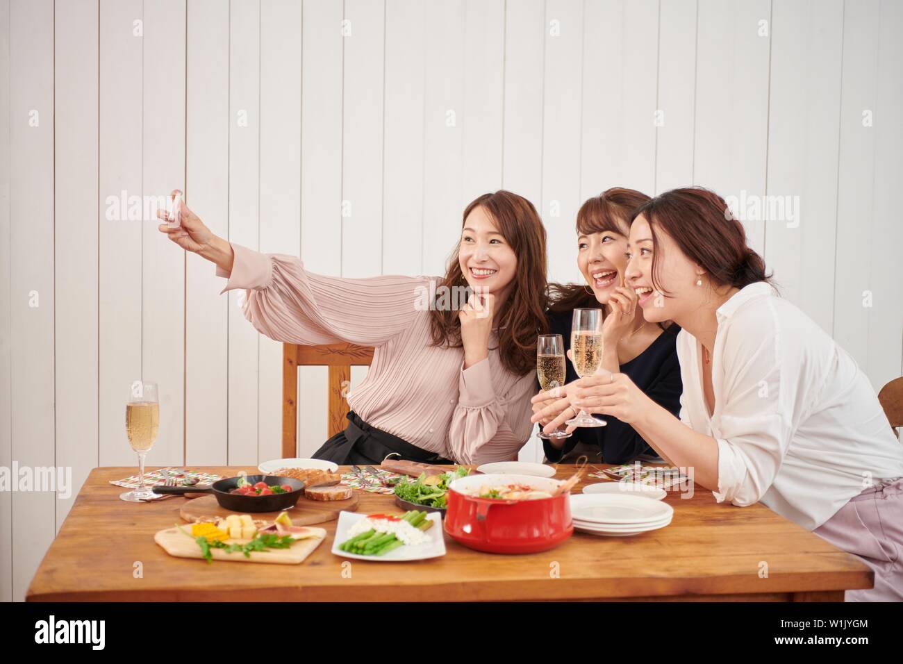 Japanese women having home party Stock Photo - Alamy