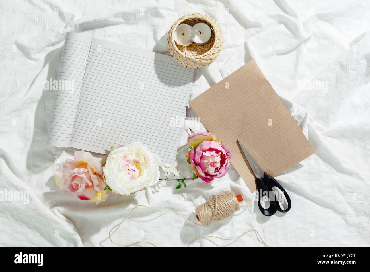 flowers with empty vintage notebook for your design Stock Photo - Alamy