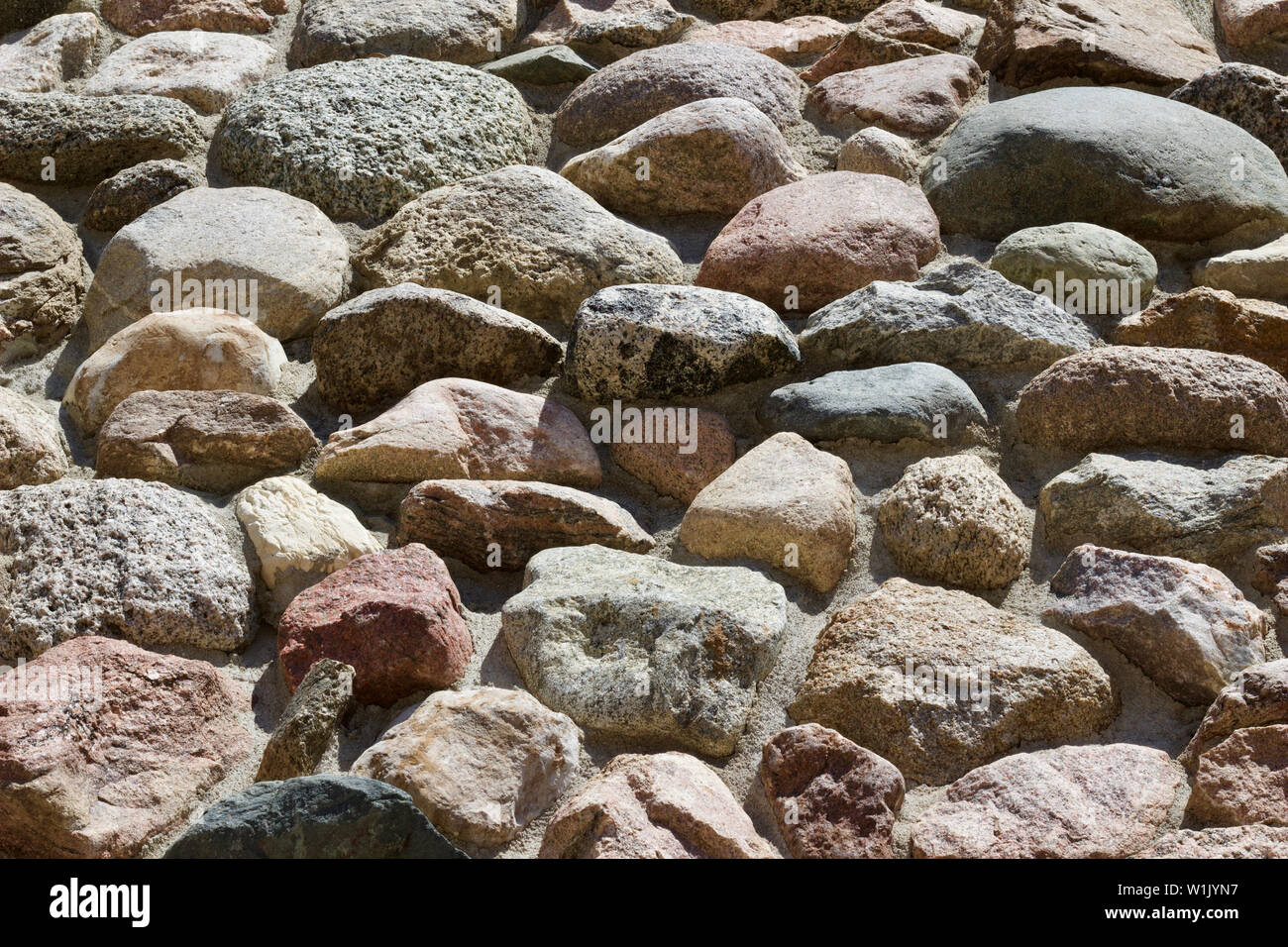 Natural stone rock wall abstract background Stock Photo - Alamy
