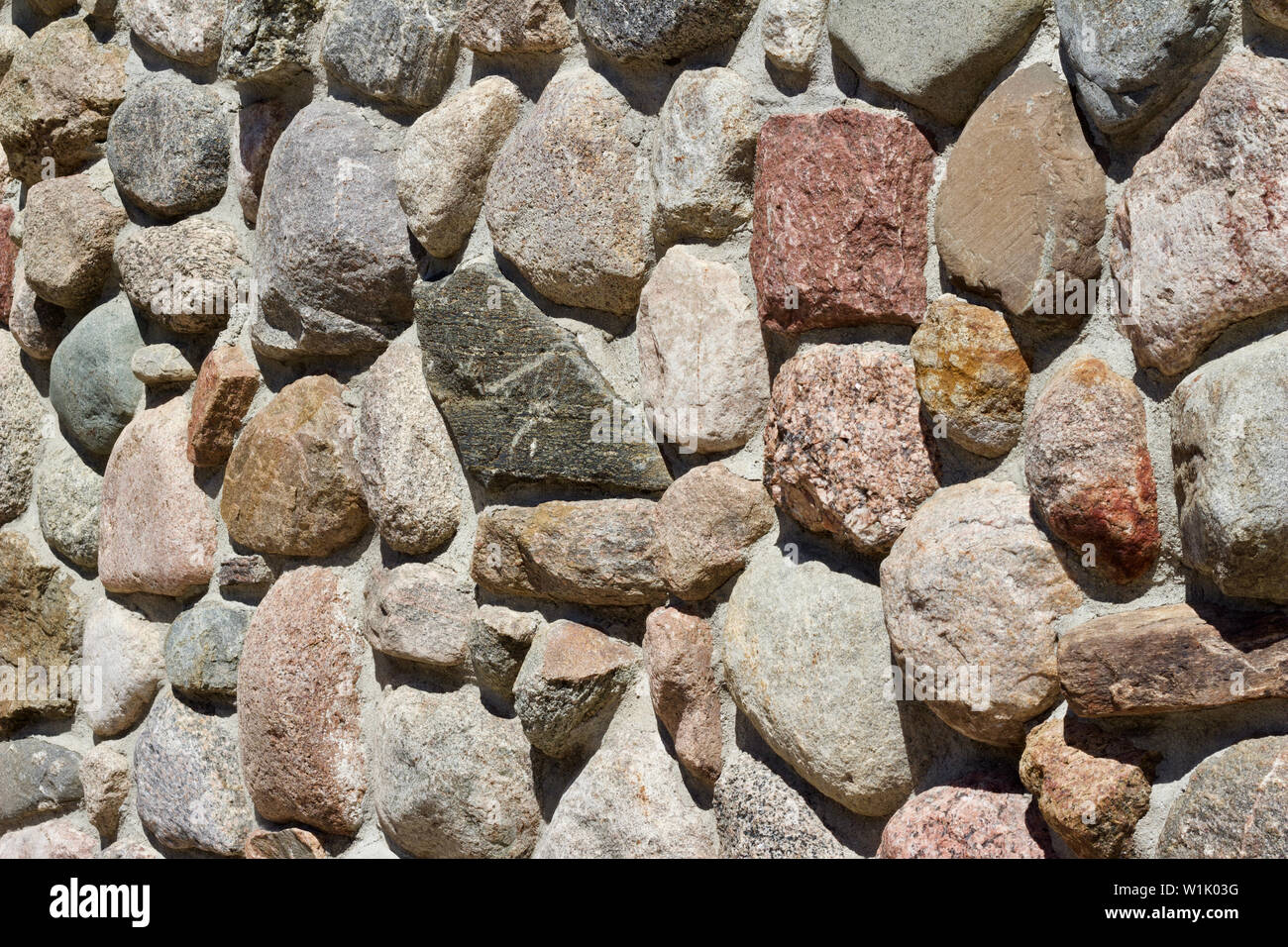 Natural stone rock wall abstract background Stock Photo - Alamy