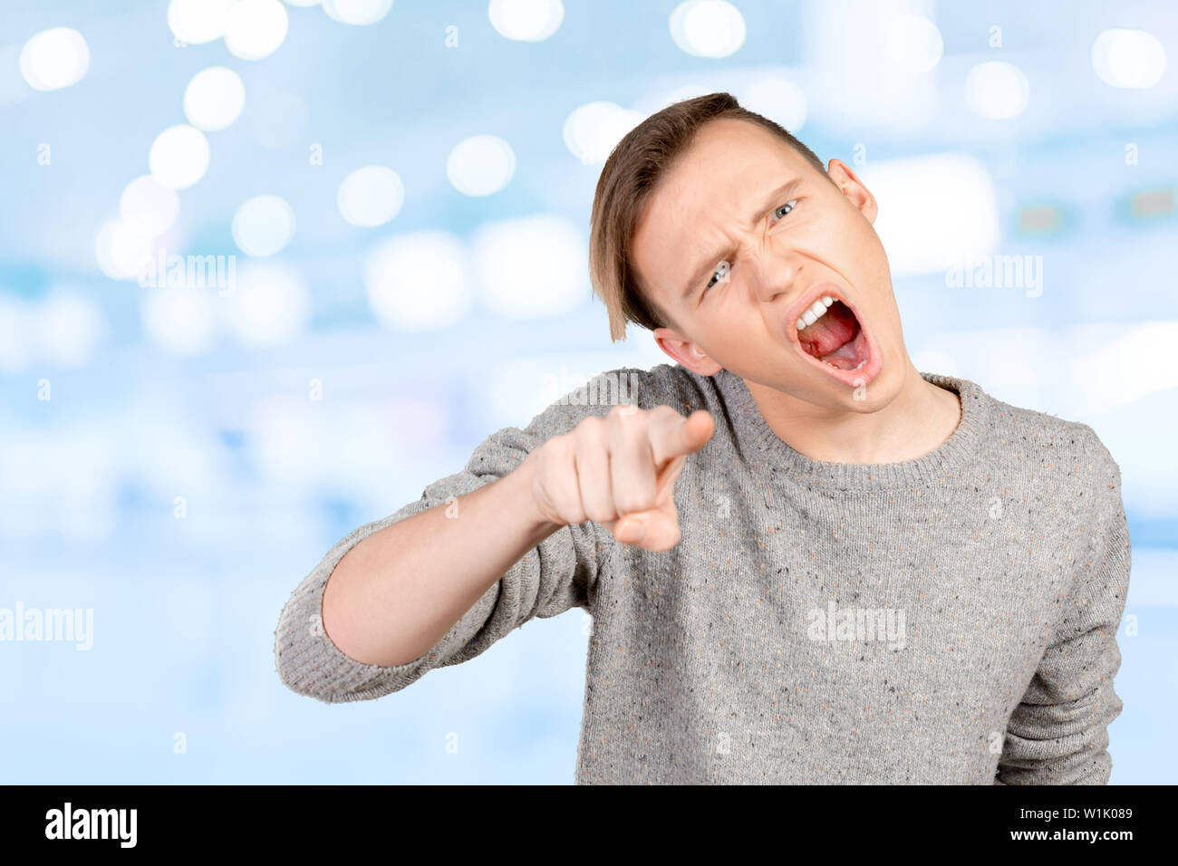 angry young man accusing you Stock Photo - Alamy