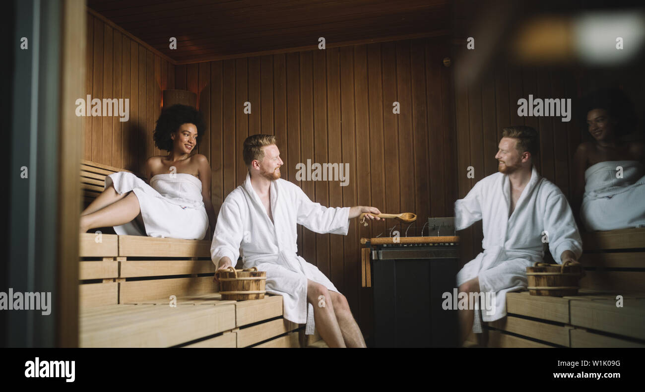 People enjoying sauna health benefits and relax Stock Photo - Alamy