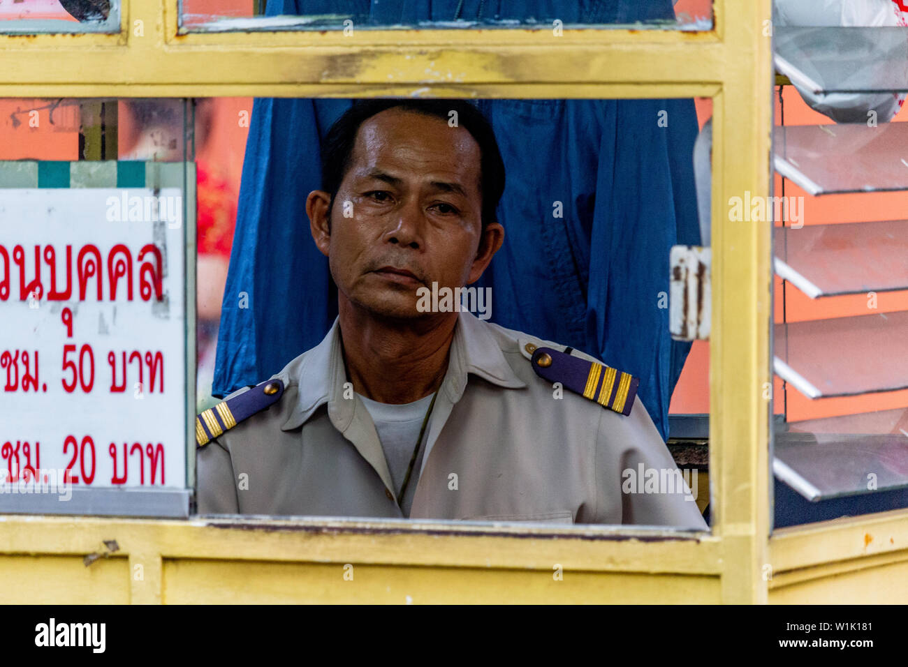 Bangkok, Thailand - April 12, 2019: Security officer standing in a ...