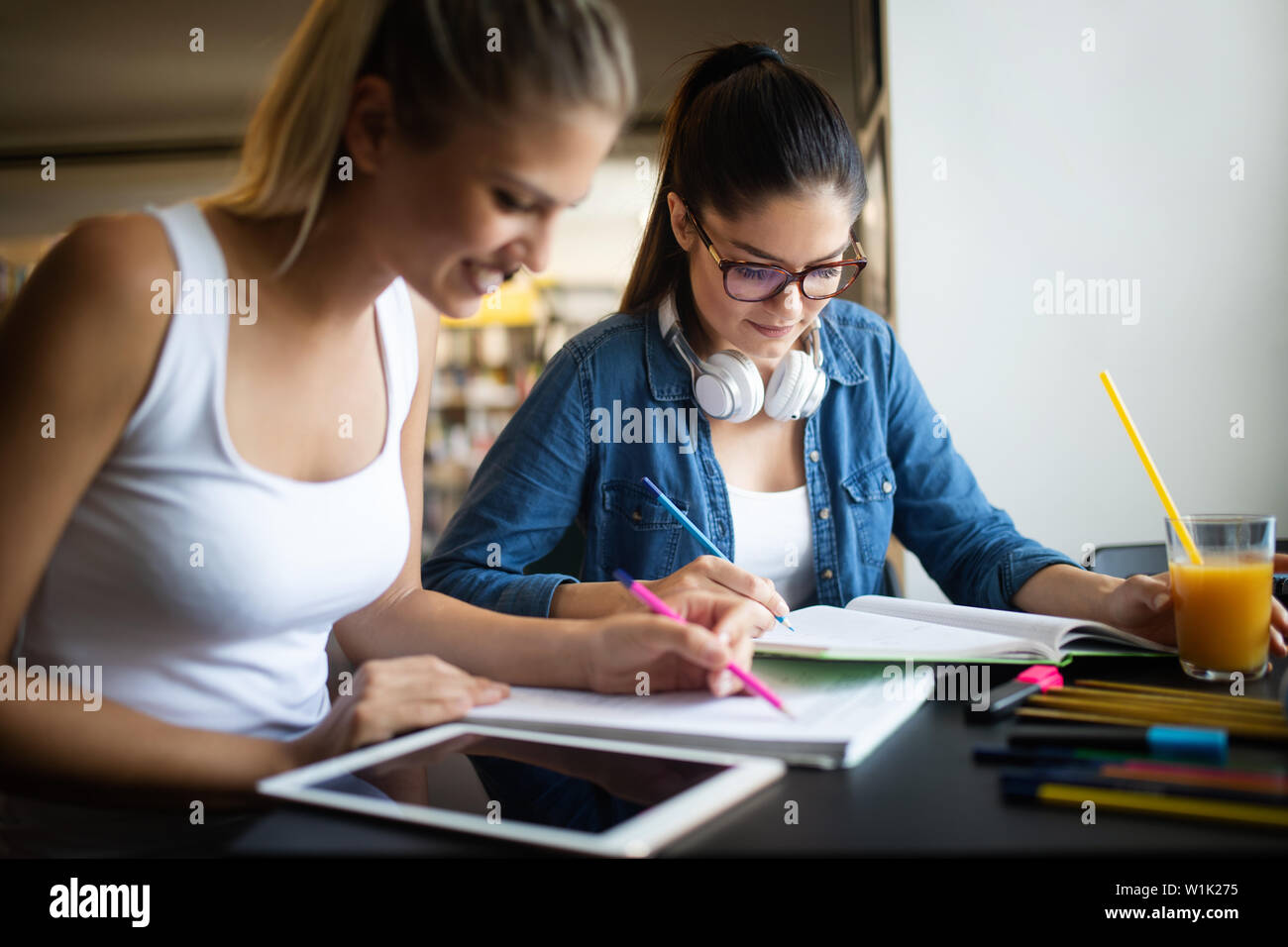 Group of friends studying together at university campus Stock Photo - Alamy