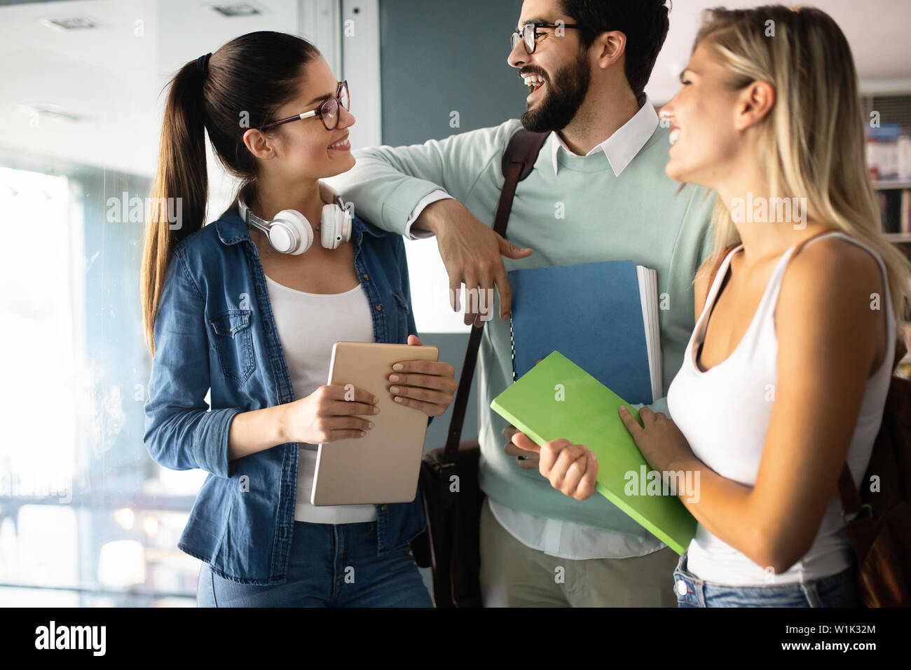 Group of friends studying together at university campus Stock Photo - Alamy