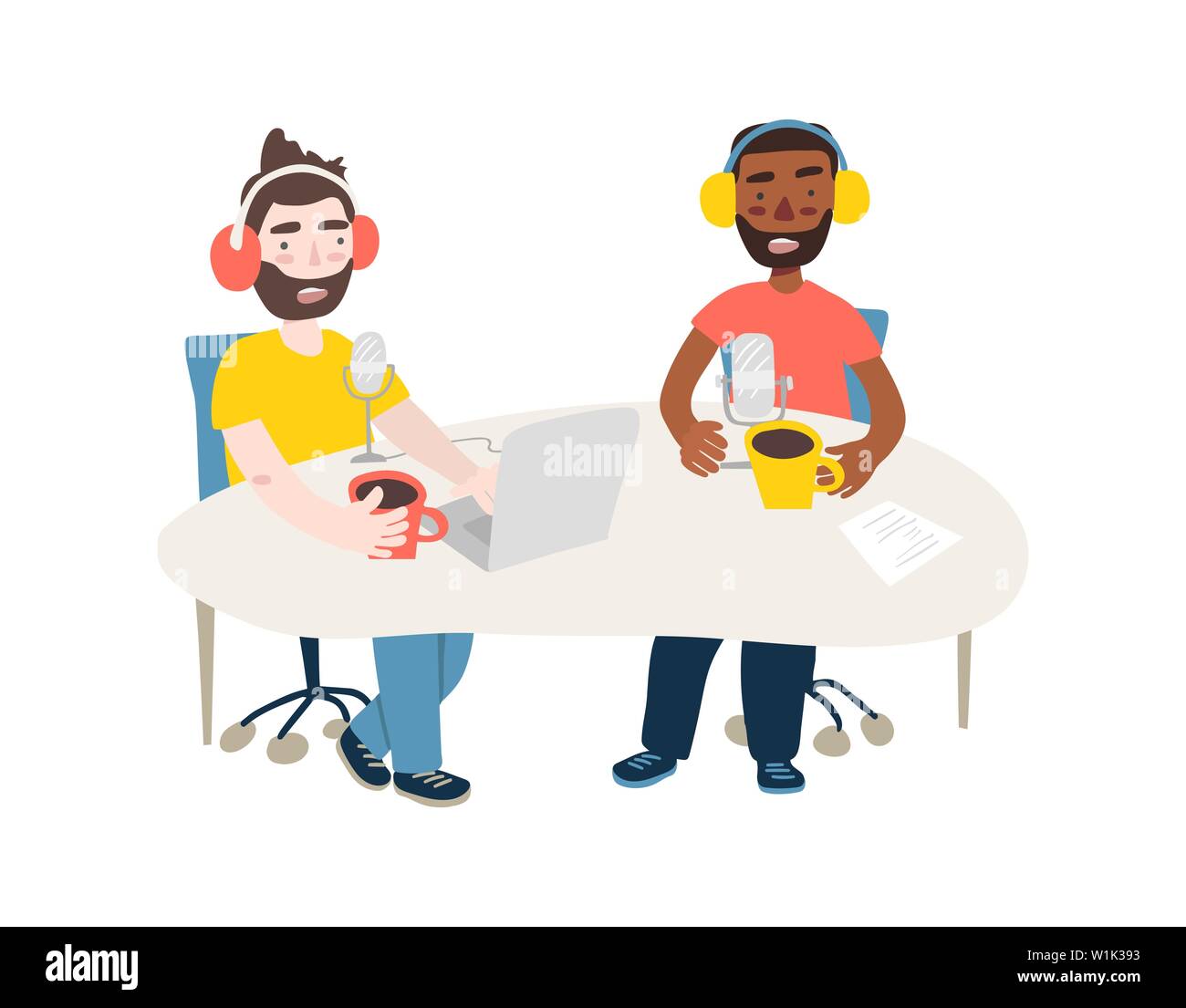 Young men recording a podcast in a studio with microphone and laptop ...