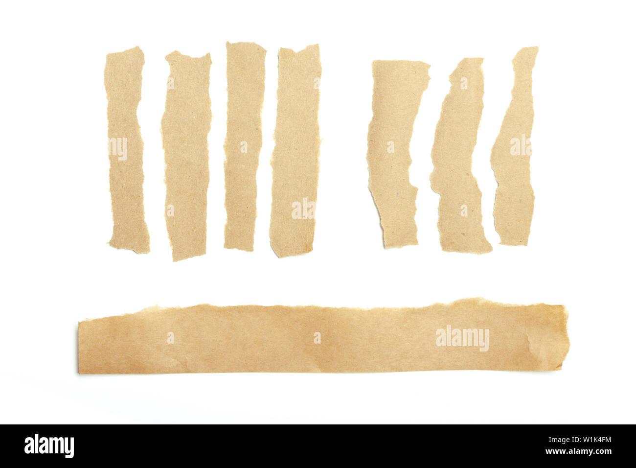 brown ripped pieces of paper on white background Stock Photo - Alamy