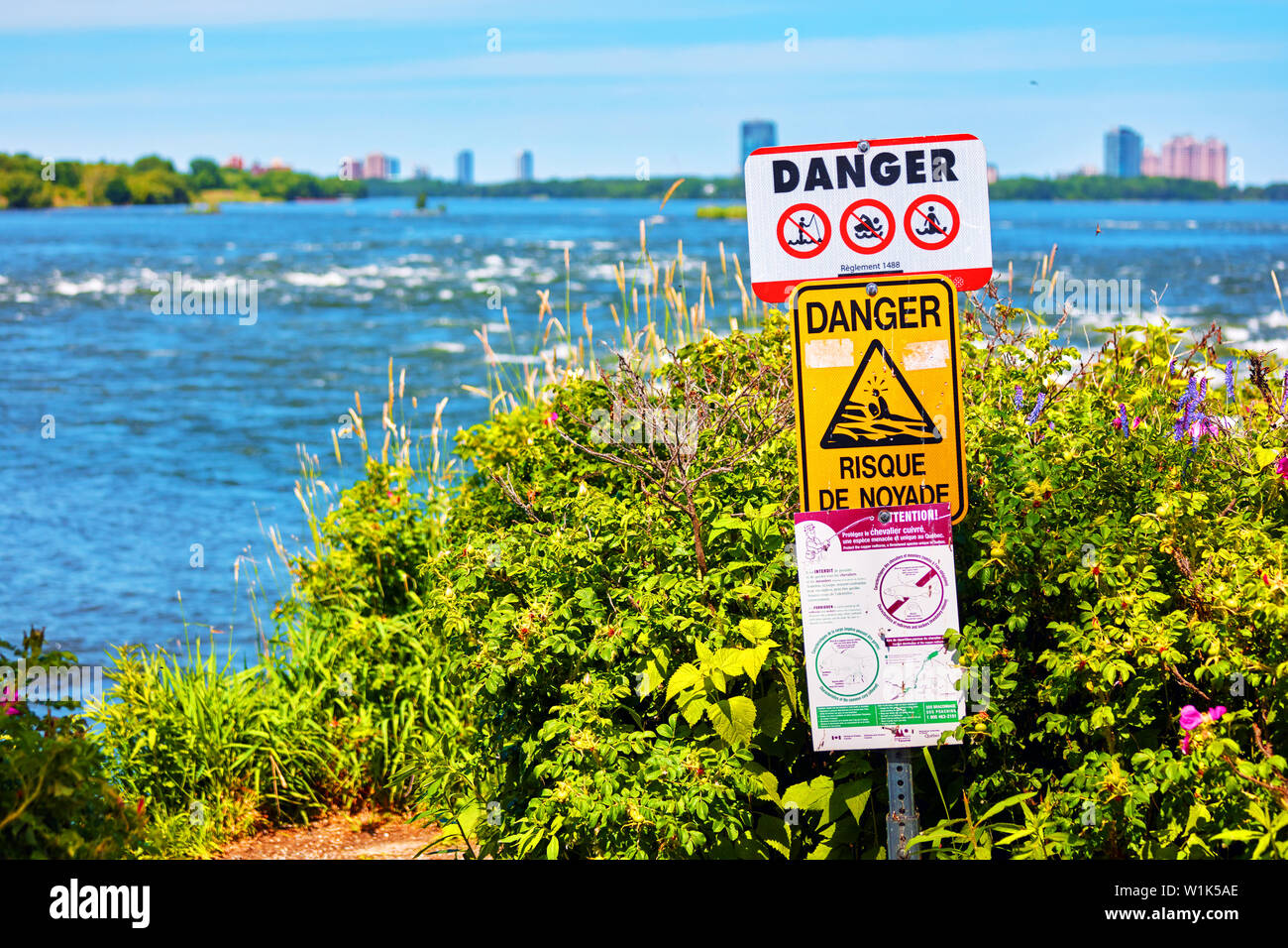 Rapids warning sign against river background in lachine rapids park in ...