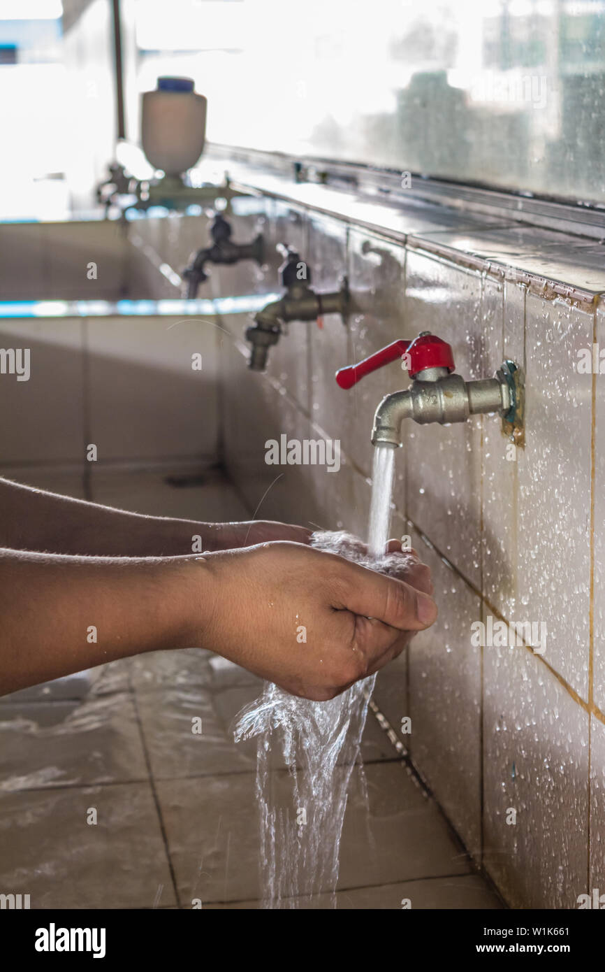 Washing of hands with soap under running water Stock Photo - Alamy