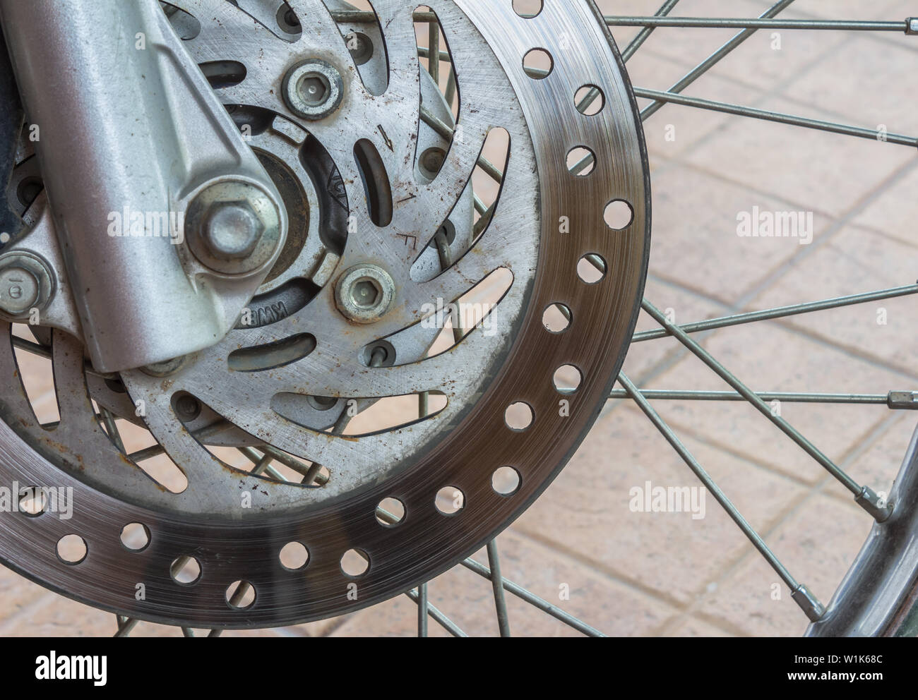 Detail of the front wheel of a motorcycle with disc brake Stock Photo ...