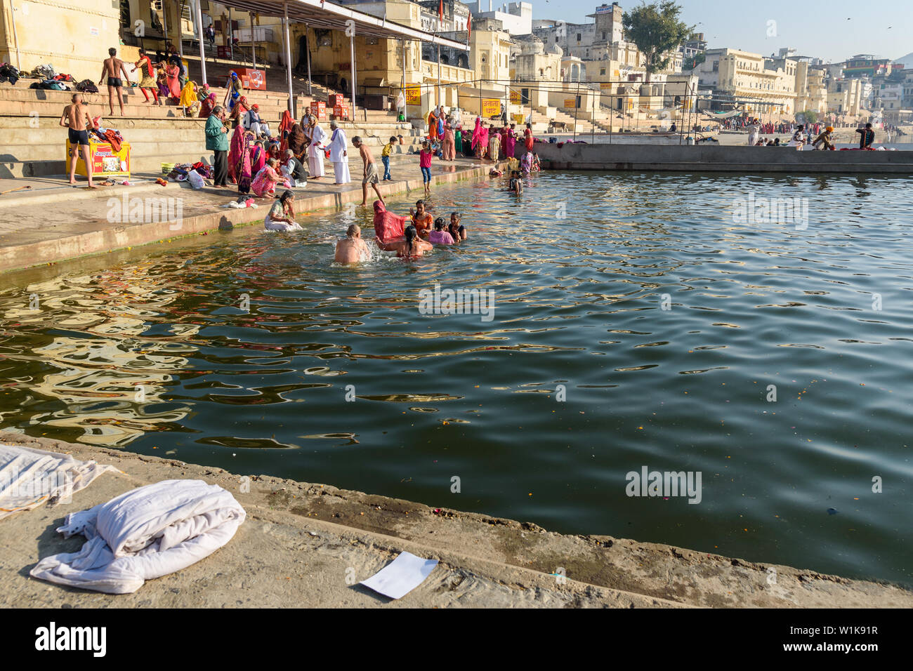 Indian woman bathing in holy hi-res stock photography and images - Alamy