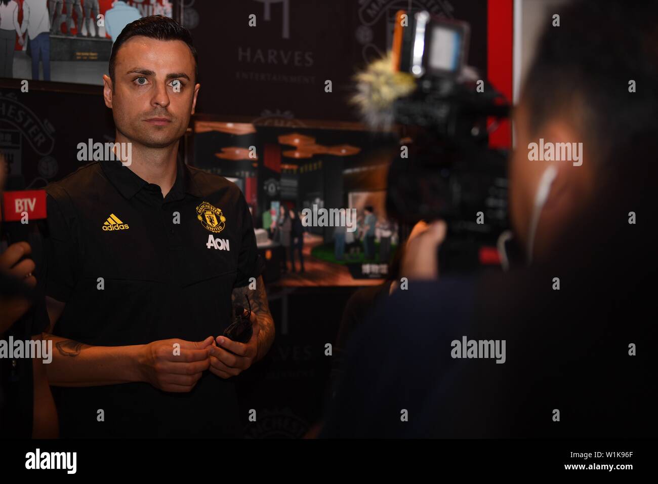 Bulgarian football player Dimitar Berbatov attends a promotional event ...