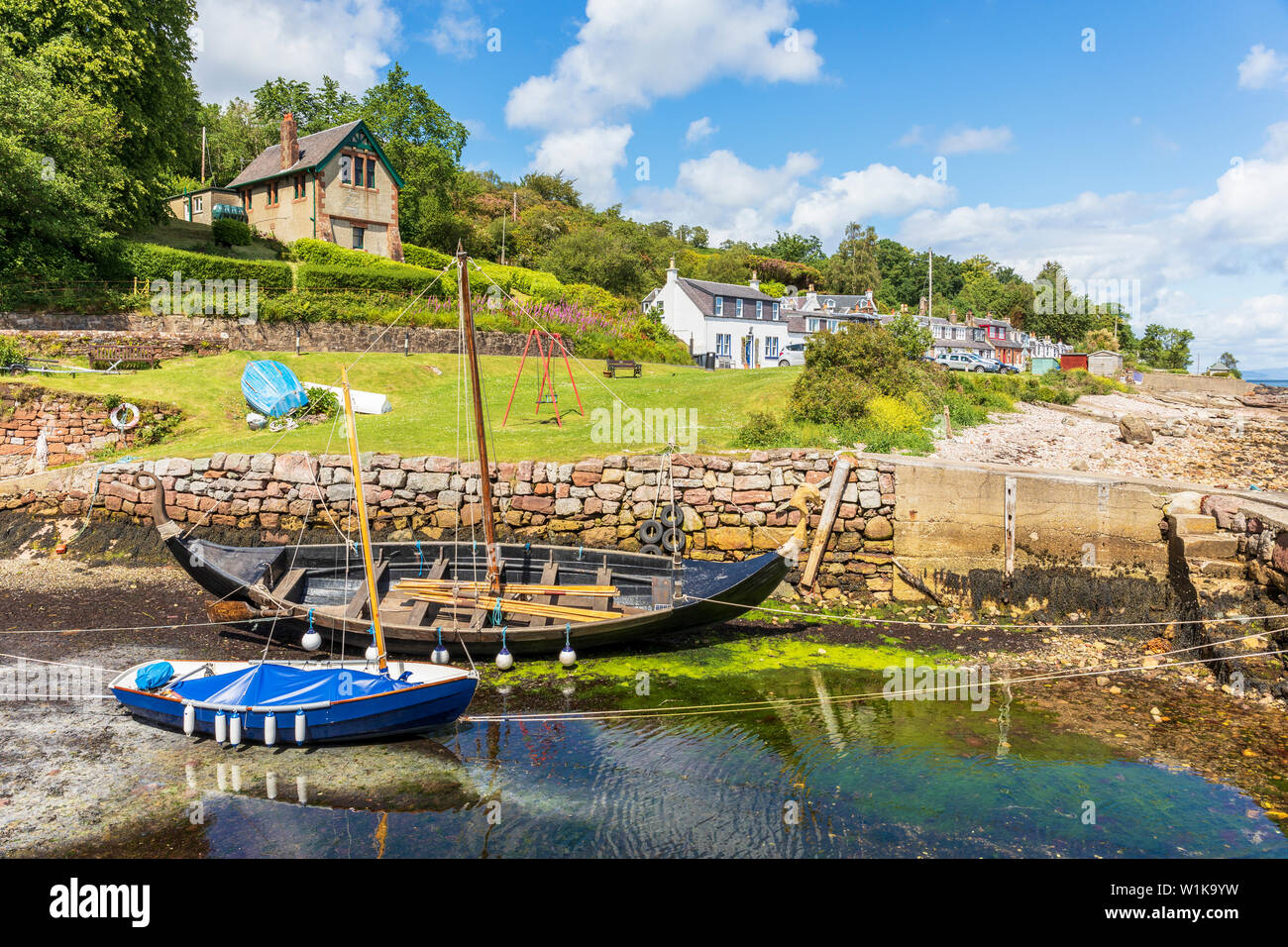 Small harbour at Sannox, Isle of arran on the Firth of Clyde with boats ...