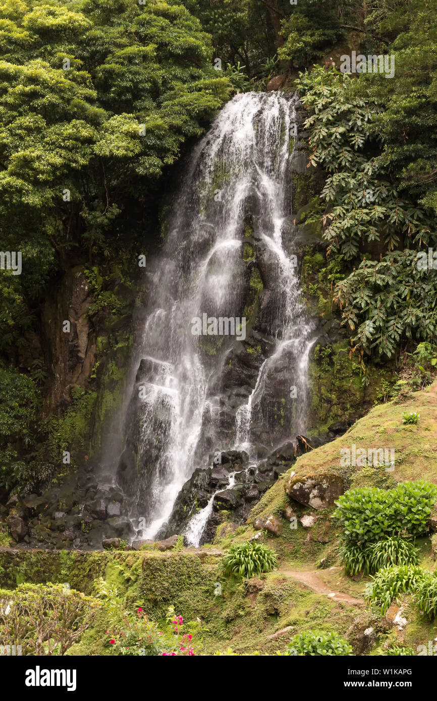 Large waterfall in the natural park with a watermill in Nordeste, Sao ...