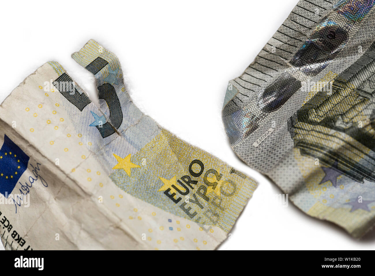 torn ripped money, real broken five euro bill isolated on white Stock ...
