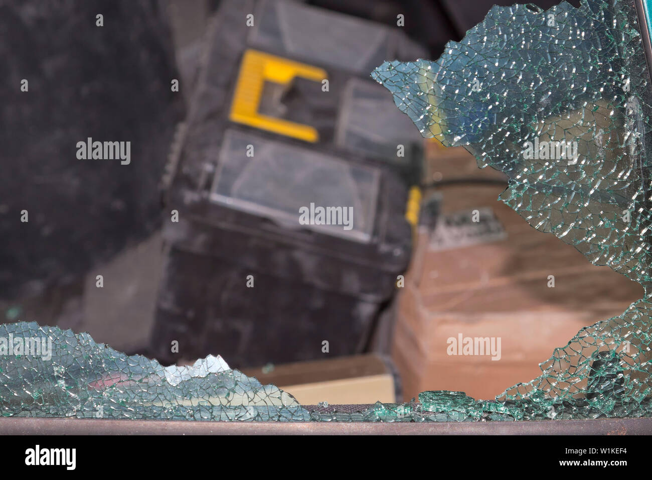 Smashed car window on the vehicle of a craftsman, Berlin Stock Photo ...