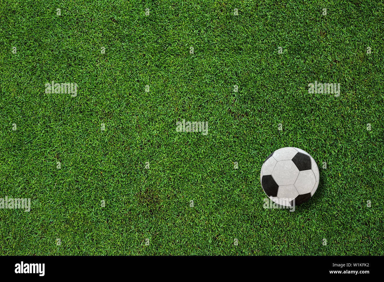 Soccer ball on the field Stock Photo - Alamy