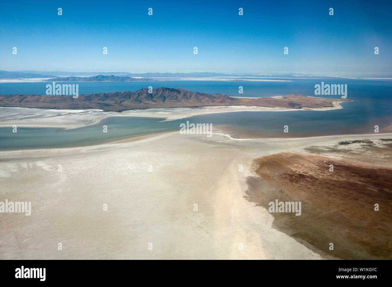 White salty sand stands out in the Great Salt Lake leading up to the ...