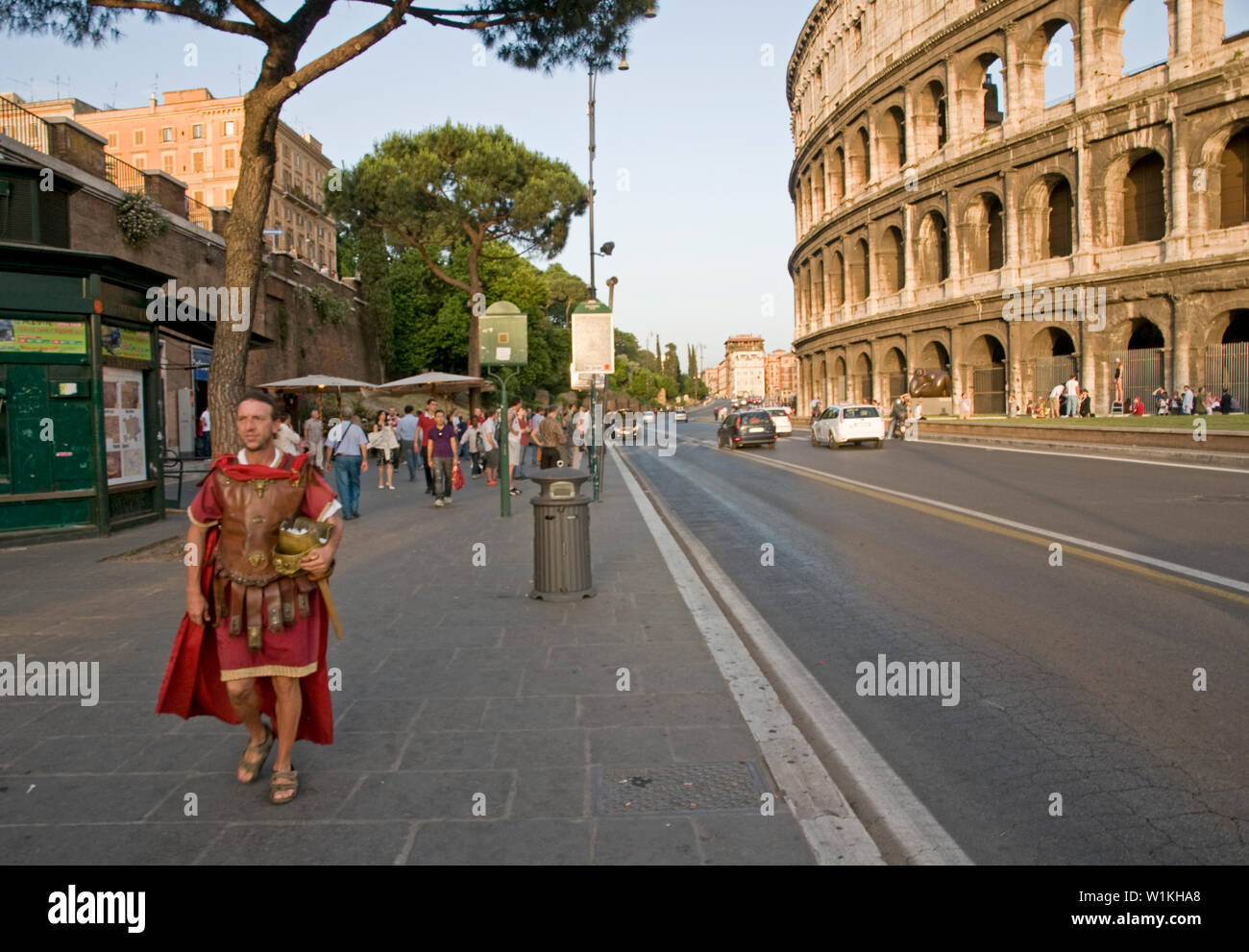A gladiator finds his way along the street adjacent to the Colosseum in ...