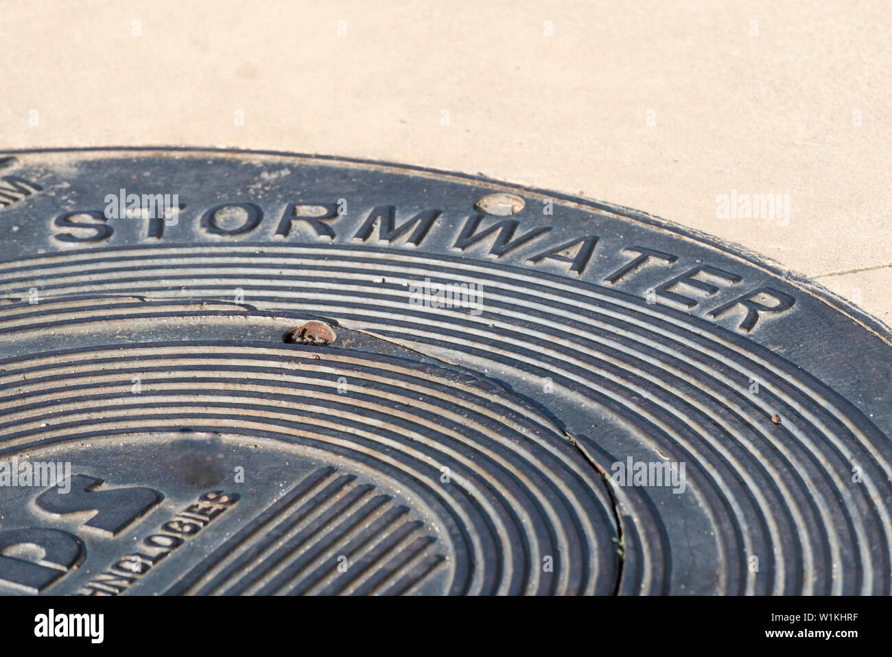 A storm water drain cover or culvert in a footpath in Sydney Australia ...