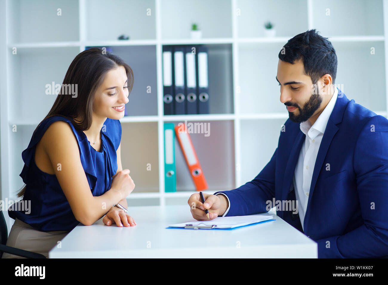 Portrait of two business people at work Stock Photo - Alamy