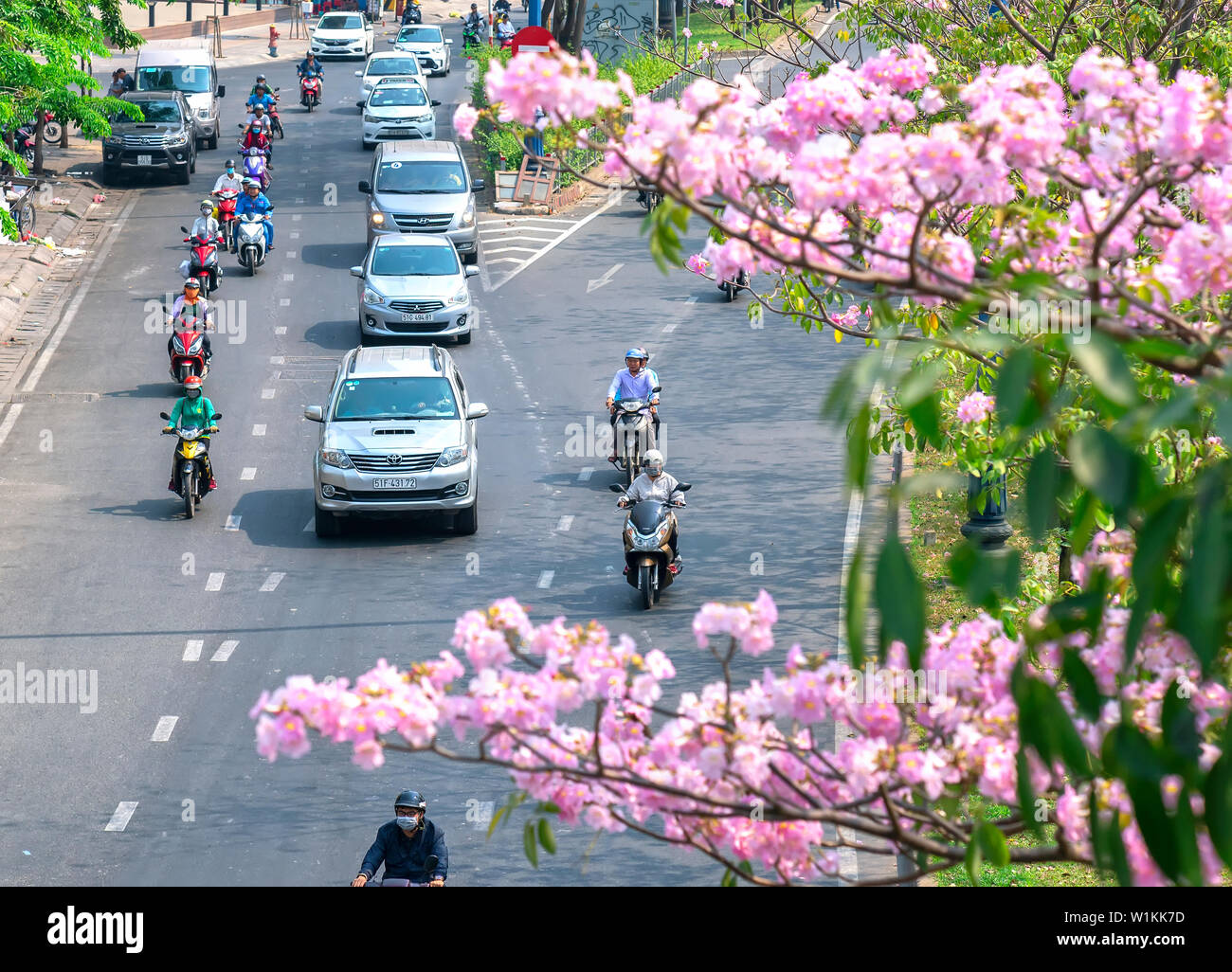 Traffic Saigon from high view, street with motorbikes, car move under ...