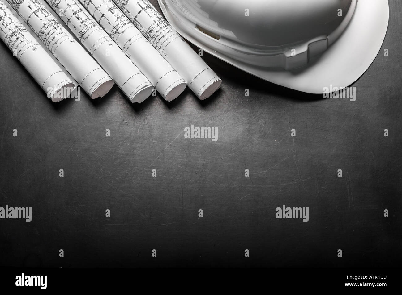 Construction planning drawings on black background Stock Photo - Alamy