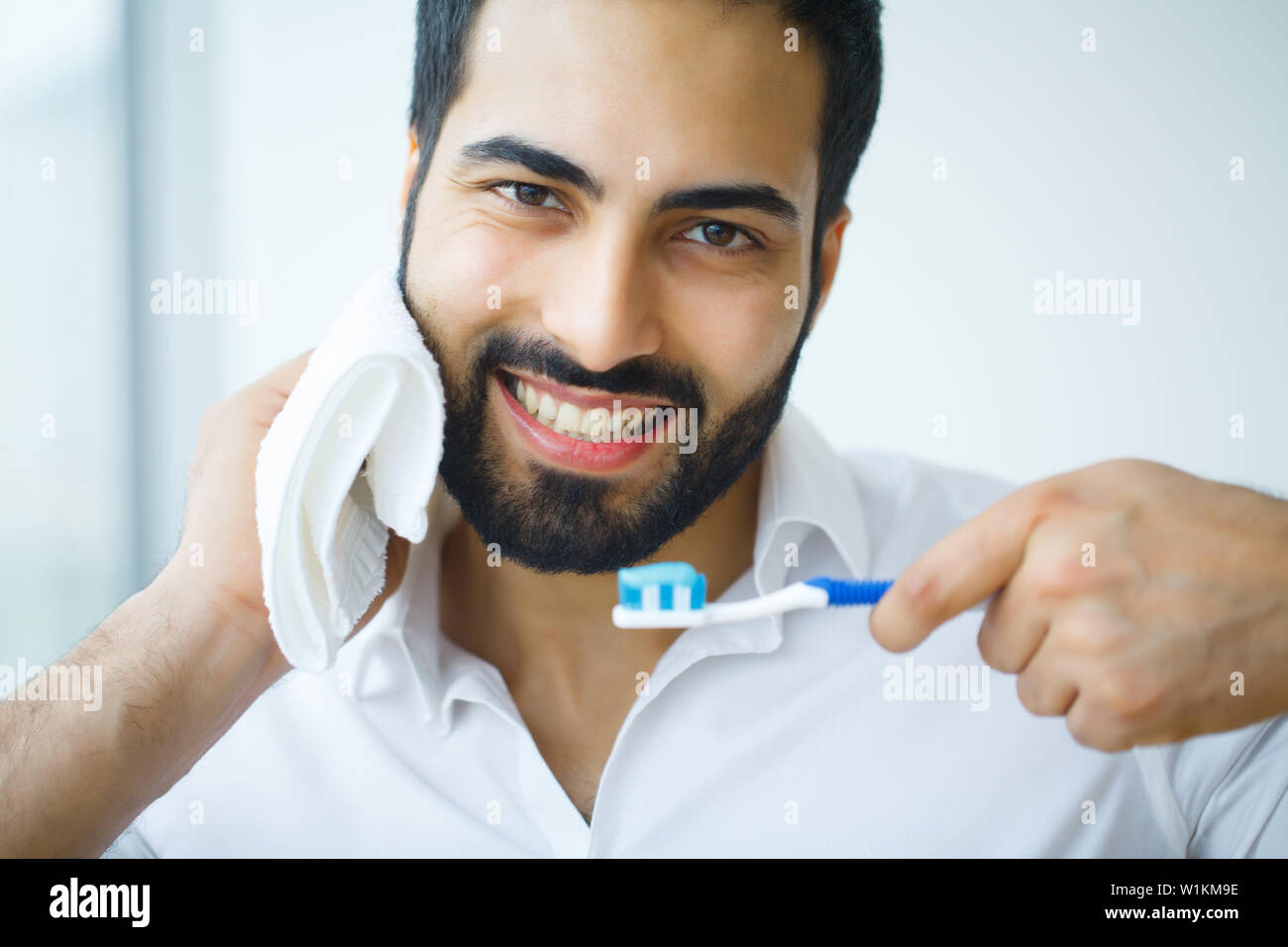 Man With Beautiful Smile, Healthy White Teeth With Toothbrush. High ...