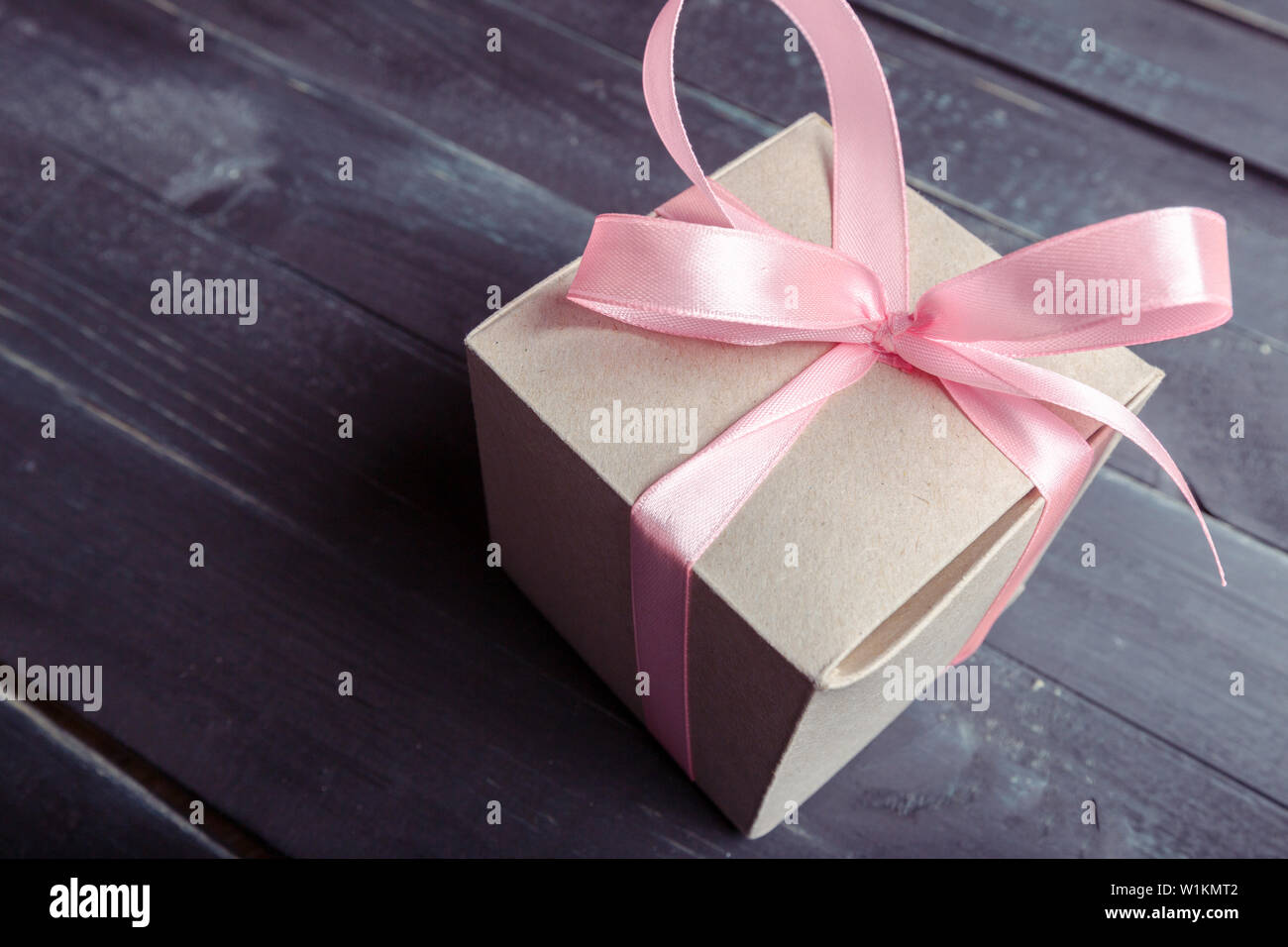 Gift box with ribbon Stock Photo - Alamy