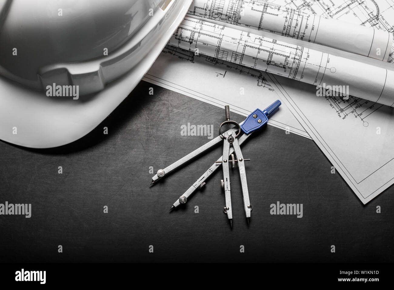 Construction planning drawings on black background Stock Photo - Alamy